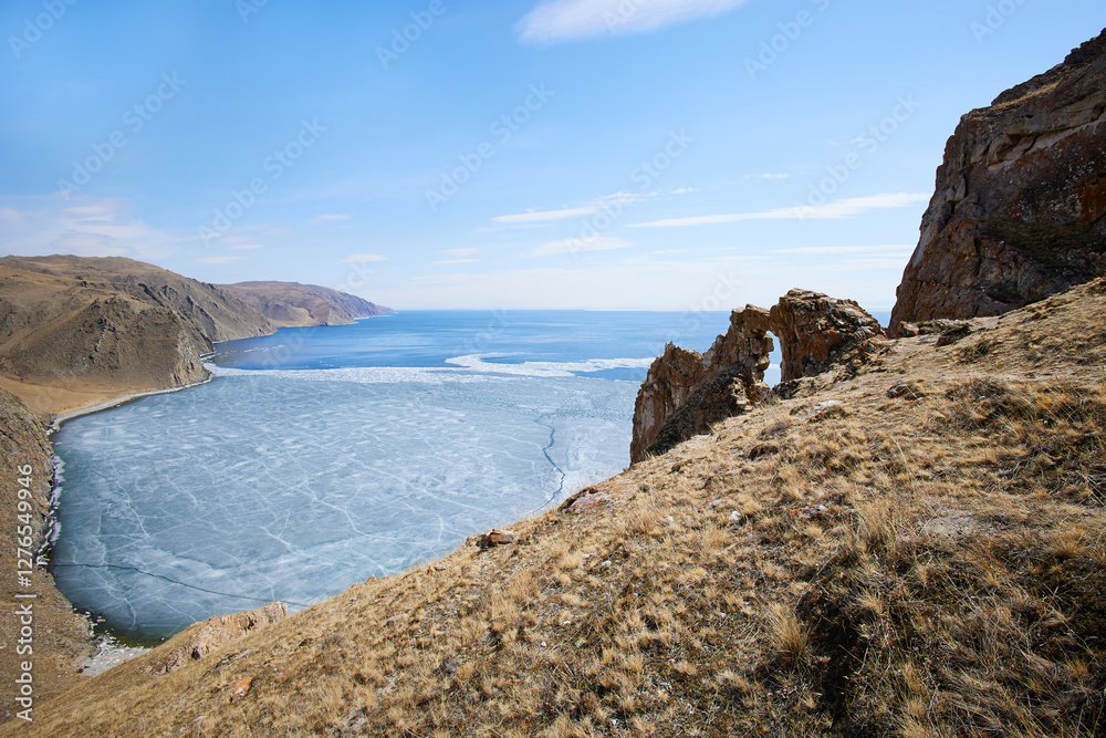 Beautiful view of the lake, stone arch in the rock. Panorama of Lake ...