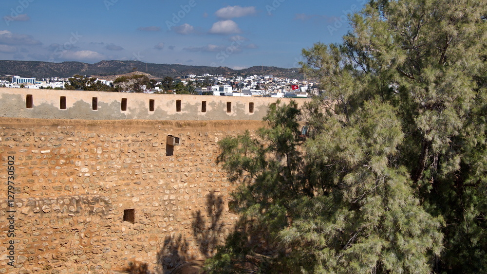 Parapet wall around the courtyard of the old fort in the medina, in ...