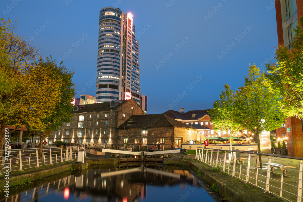Bridgewater Place skyscraper in Leeds city reflected in the water. The ...