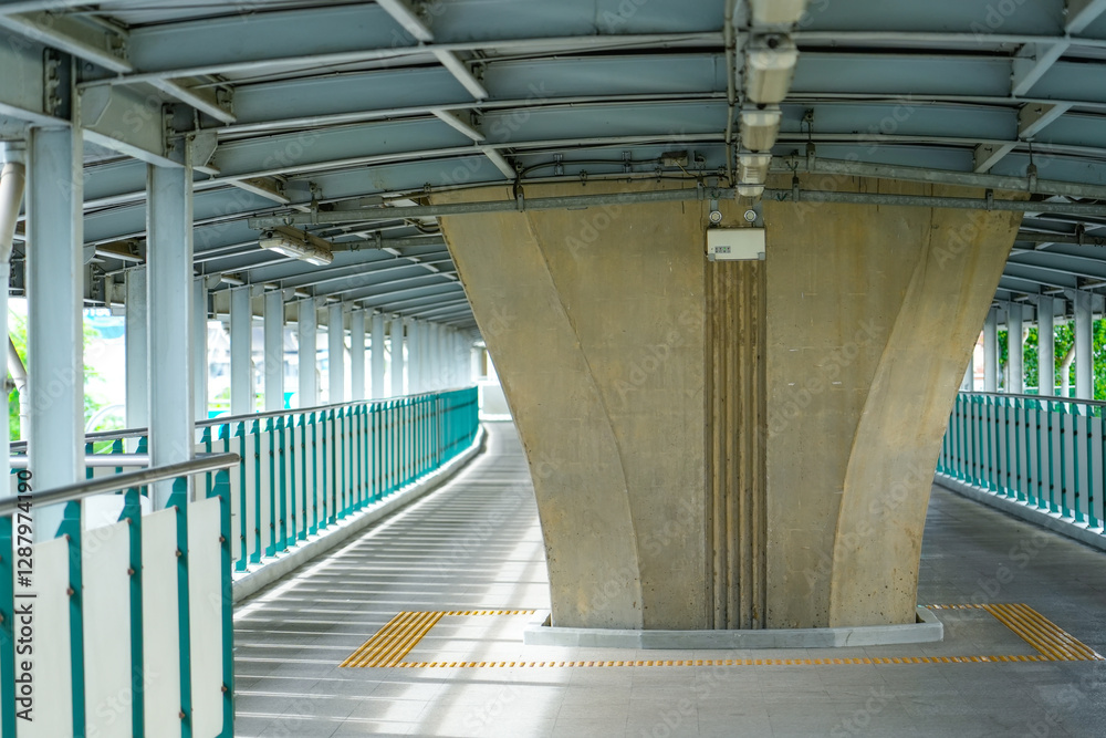 Pedestrian overpass path under the road junction at the base of the ...