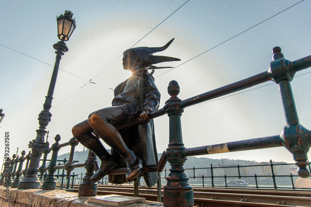 02/17/2025, Budapest. Little princess statue sitting on the railing of ...