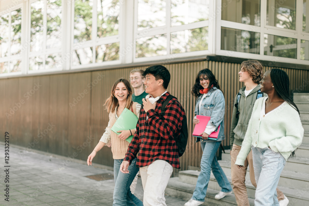 Happy diverse students walking outside school Stock Photo | Adobe Stock