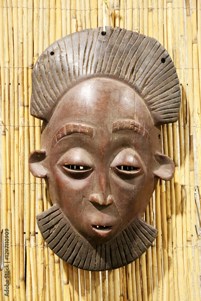 Mask carved from wood. African tribal mask and the mask trait. Tribal ...