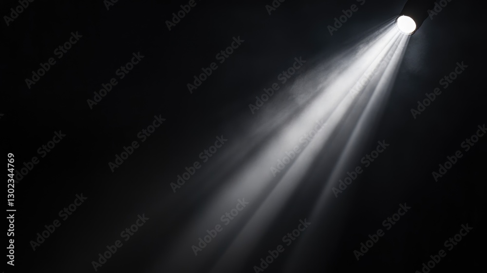 Vintage spotlight emitting powerful beam of light. Black background ...