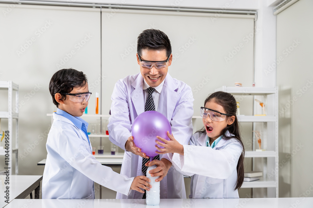 Young scientists in laboratory – Asian kids and teacher conducting ...