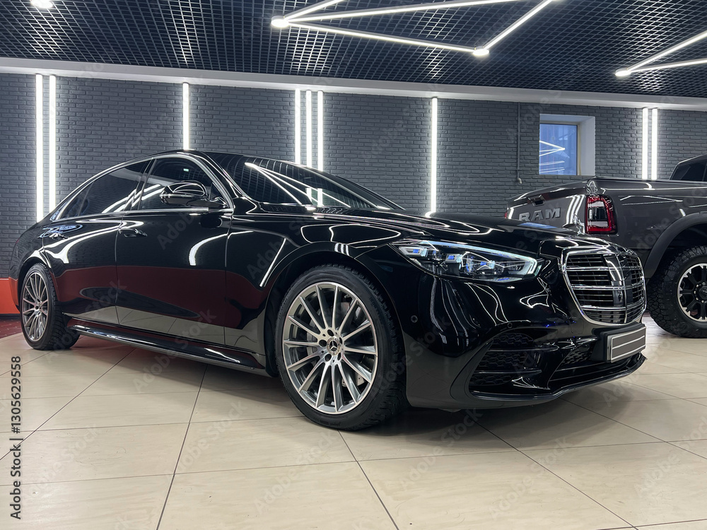 Black Mercedes-Benz S63 S-class w223 in the showroom side view. Allure ...