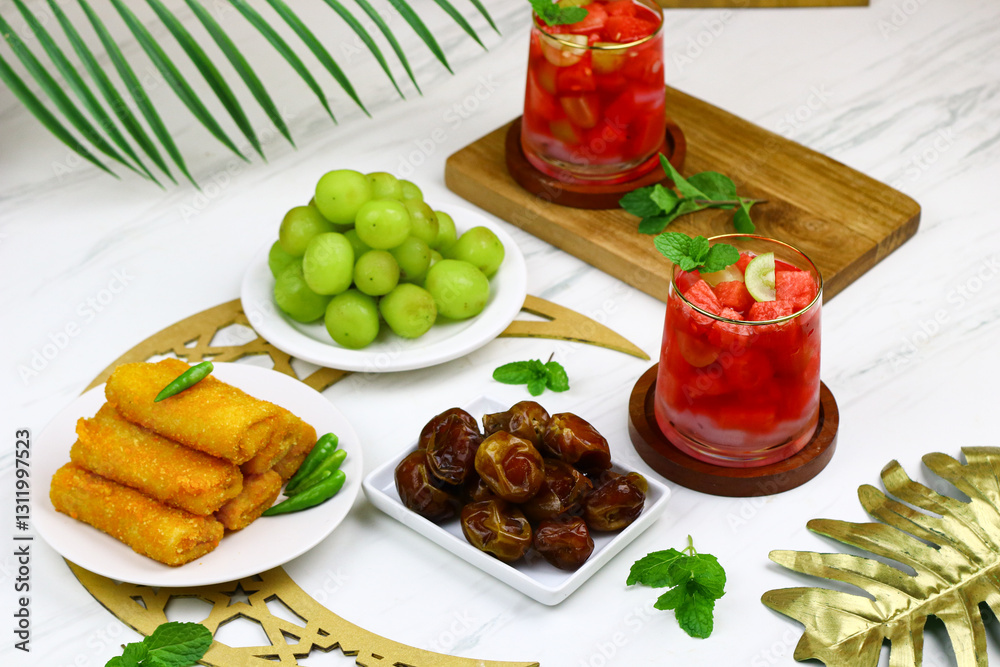 Typical Indonesian iftar menu in ramadan month. Fruit ice, dates fruit ...
