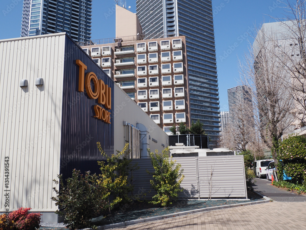 TOKYO, JAPAN - March 7, 2025: Tokyo's Harumi area with a Tobu Store ...