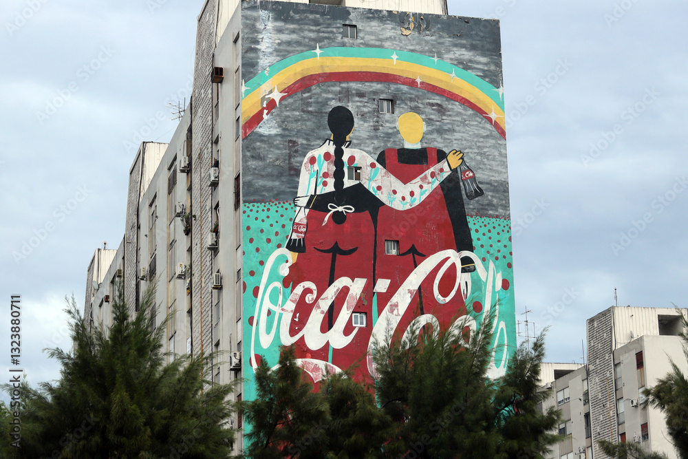 Coca-Cola advertising mural painted on a building in the city of Buenos ...