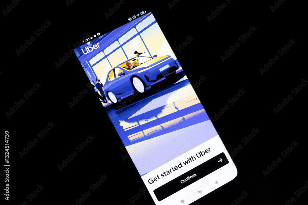 Warsaw, Poland - March 10, 2025: A smartphone displaying Uber app ...