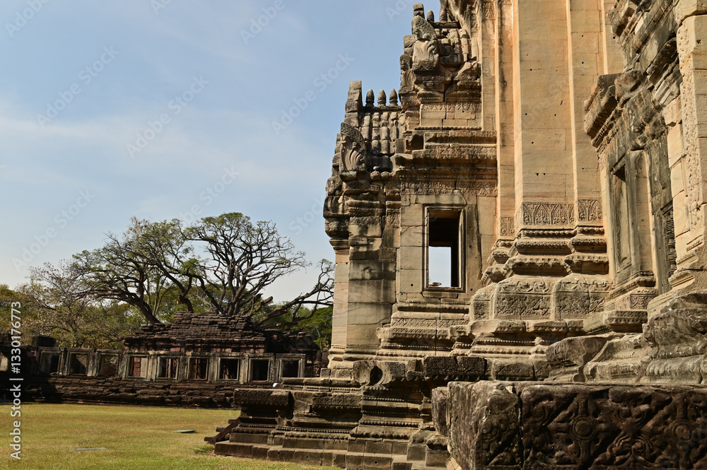 Side view of entrance gate to the Main Prasat of Phimai Historical Park ...