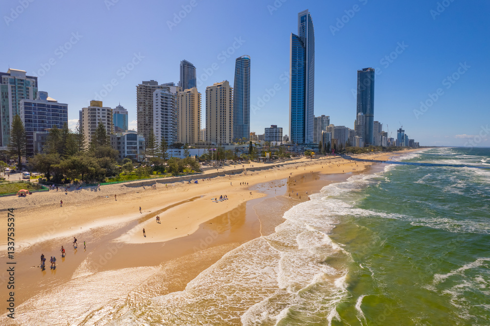 Tourists return to Surfers Paradise after the beach suffered storm ...