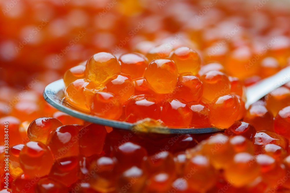 Red caviar. Salmon fish roe. Ikura. Fresh trout caviar. Fish roe is a ...