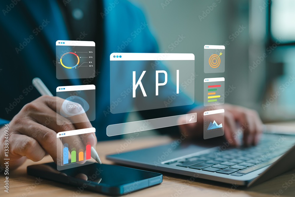 Analyzing Key Performance Indicators. Businessman using virtual screen ...