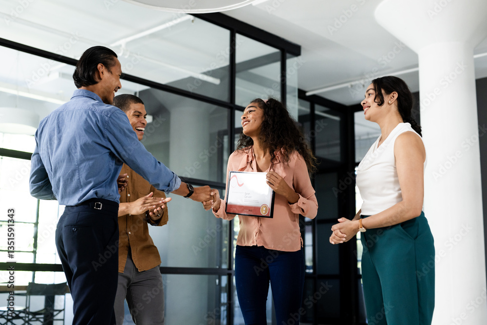 Diverse business team celebrating colleague receiving award in modern ...