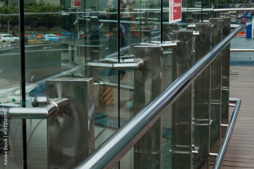 Stainless steel post and handrail for glass balustrade, applied for ...