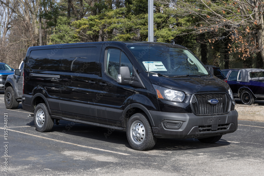 Ford Transit 250 LR Cargo Van display at a dealership. Ford offers the ...