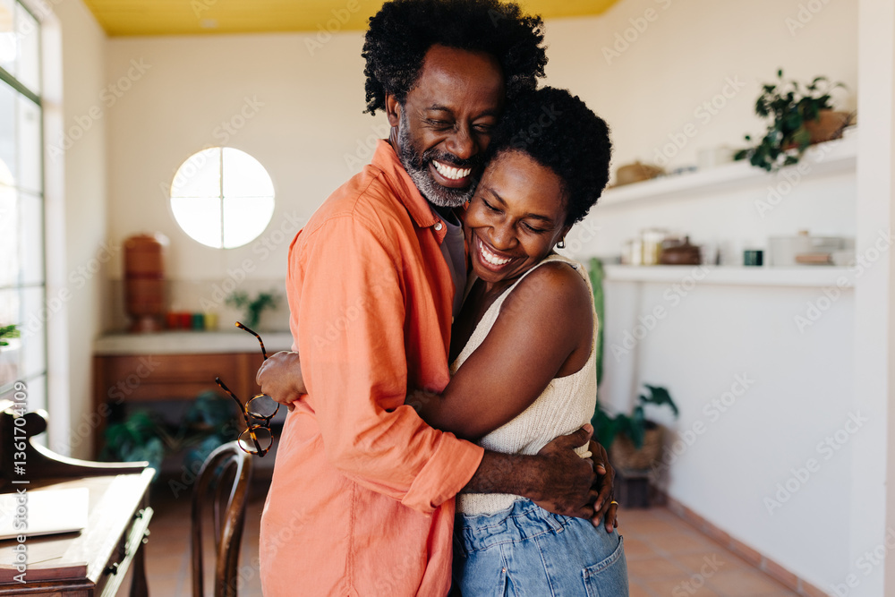Affectionate married couple holding each other lovingly, sharing a warm ...