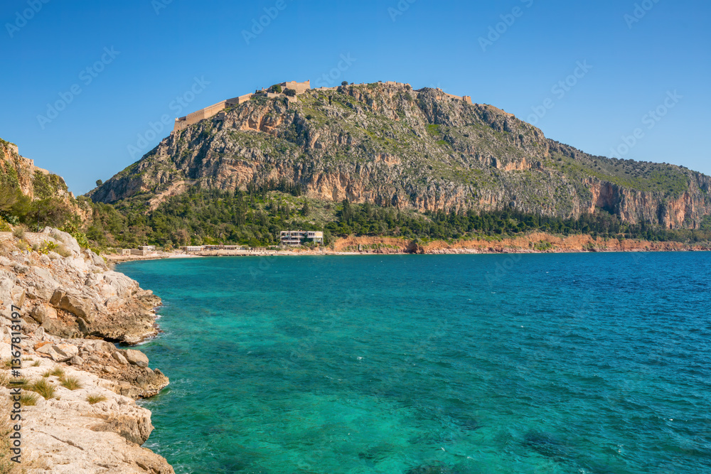 Arvanitias beach in historic city of Nafplion with Palamidi fortress on ...