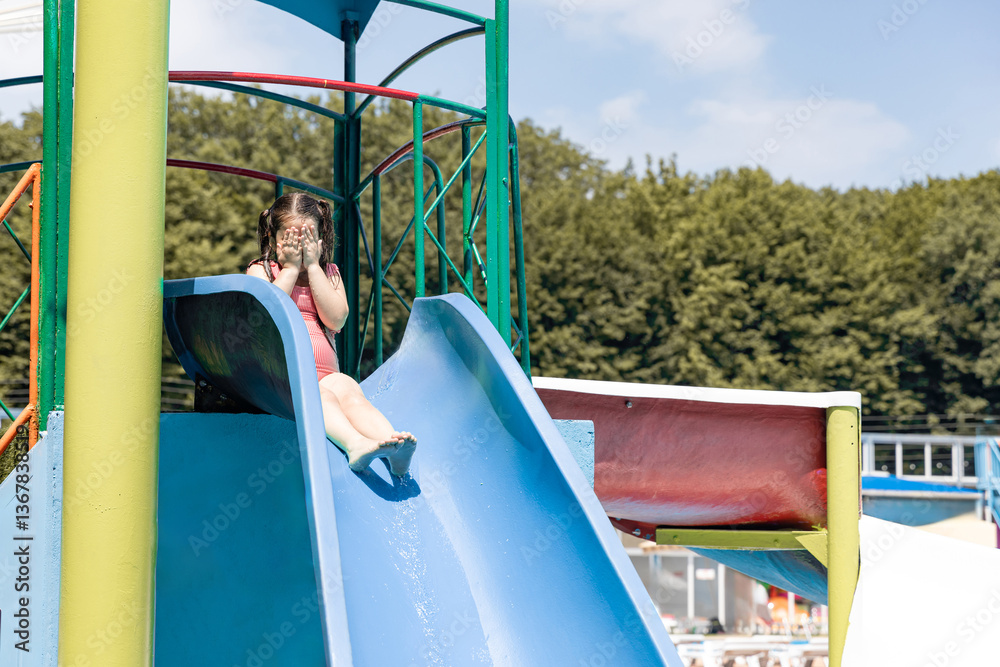 Photo Stock Exciting aquapark adventure concept. Scared cute little ...