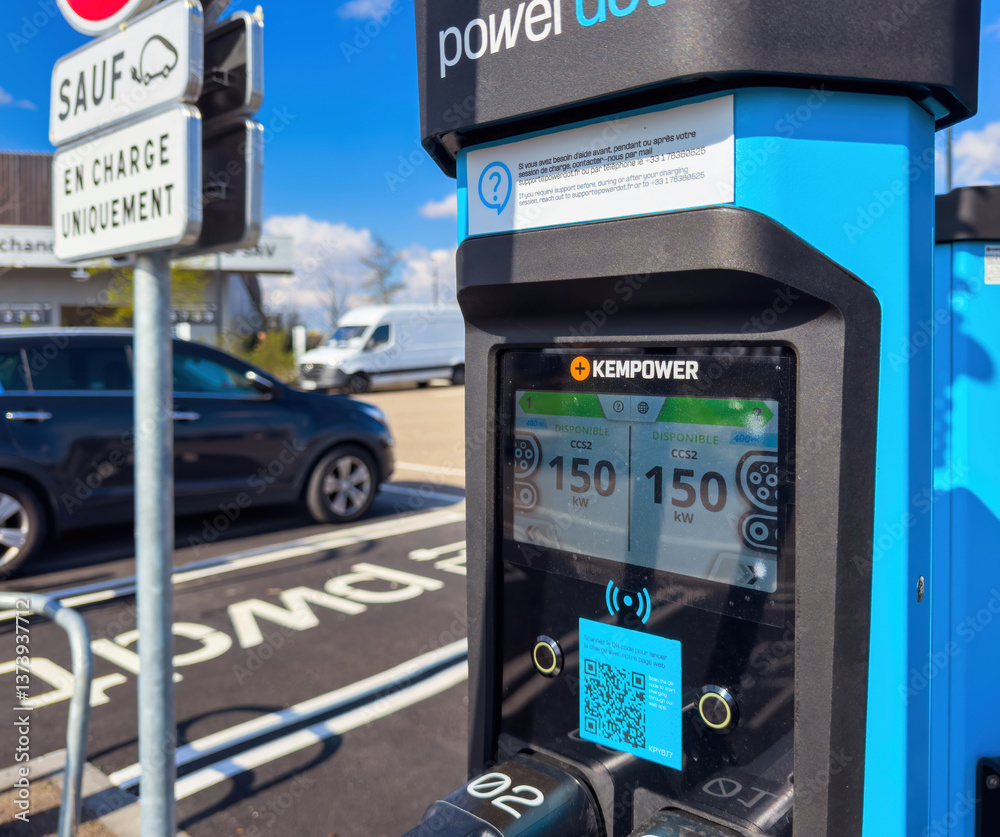 Paris, France - Mar 27, 2025: A Kempower fast-charging station displays ...