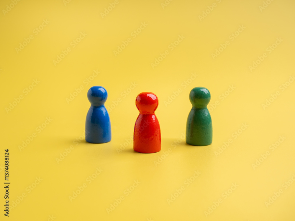 The red, green and blue, different colors of peg dolls standing ...