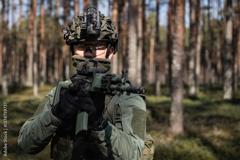 Soldier in full combat gear with helmet-mounted night vision, rifle ...