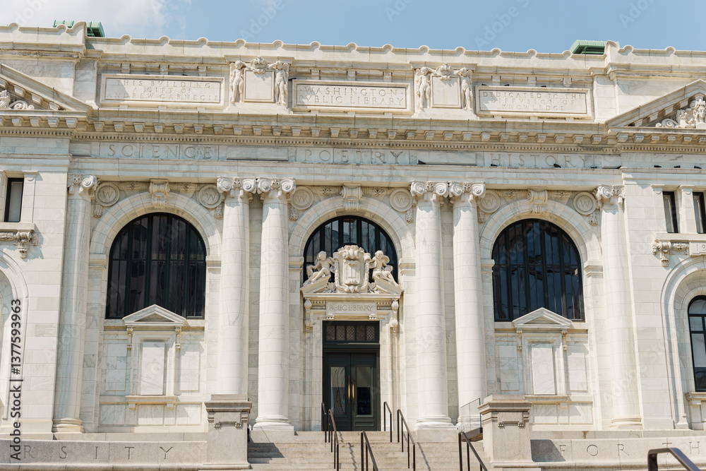 Historic neoclassical library facade with grand columns and carvings ...