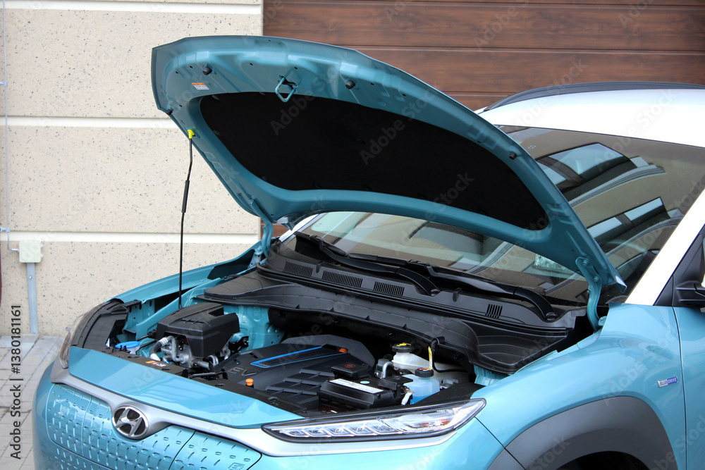 Vinnytsia, Ukraine; April 1, 2025. Blue Hyundai Kona 2020 open hood ...