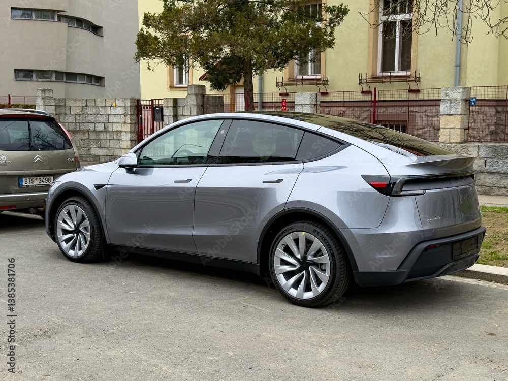 Silver Tesla Model Y Juniper electric SUV, brand new car without ...