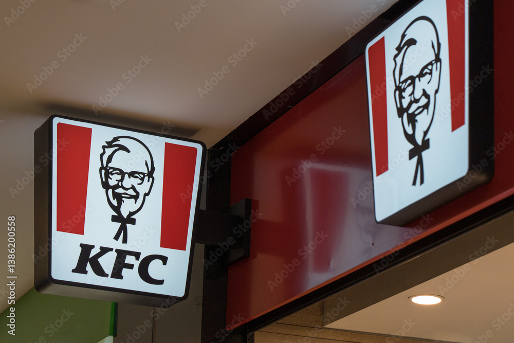 Kentucky Fried Chicken logo. KFC glowing sign on the wall in the ...