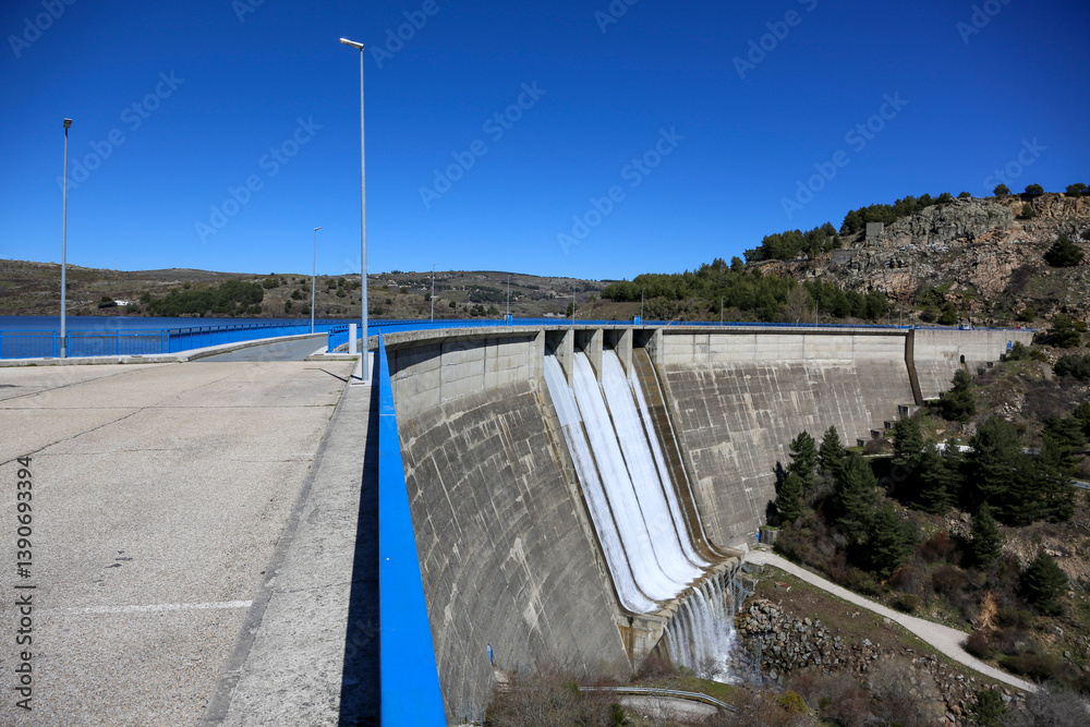 Dam releasing water in this case the one that dams the Aceña River that ...