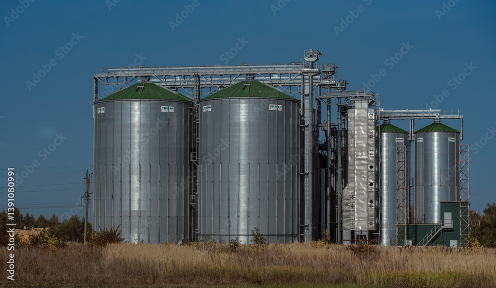 a modern agro-industrial complex - a group of metal grain storage ...