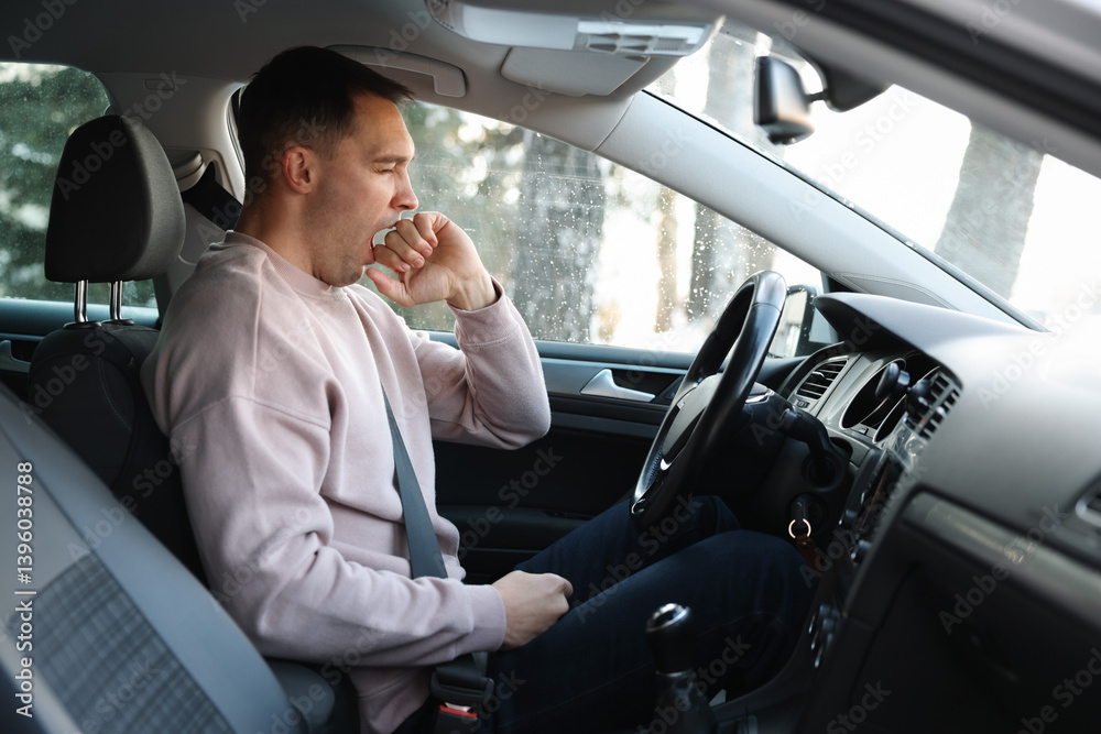 Sleepy driver yawning in his modern car Stock Photo | Adobe Stock