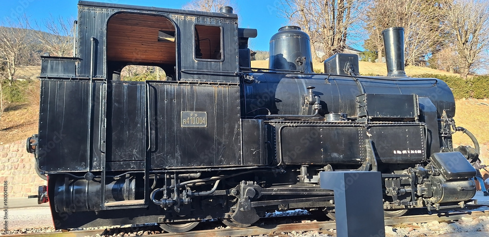 Ortisei, Italy-December 14, 2024: The black old steam locomotive in the ...