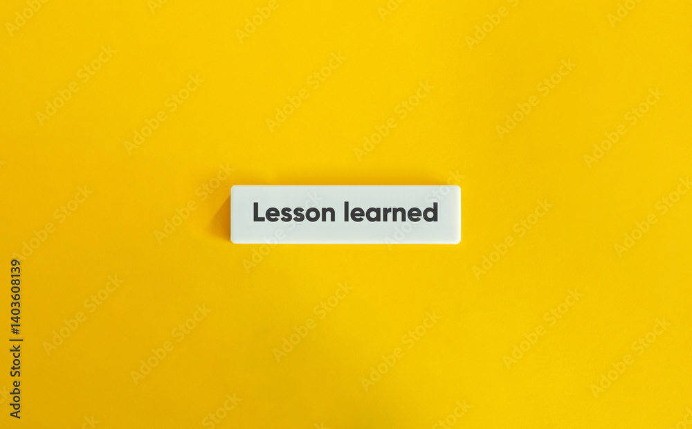 Lesson Learned Phrase. Text on Block Letter Tile on Yellow Background ...