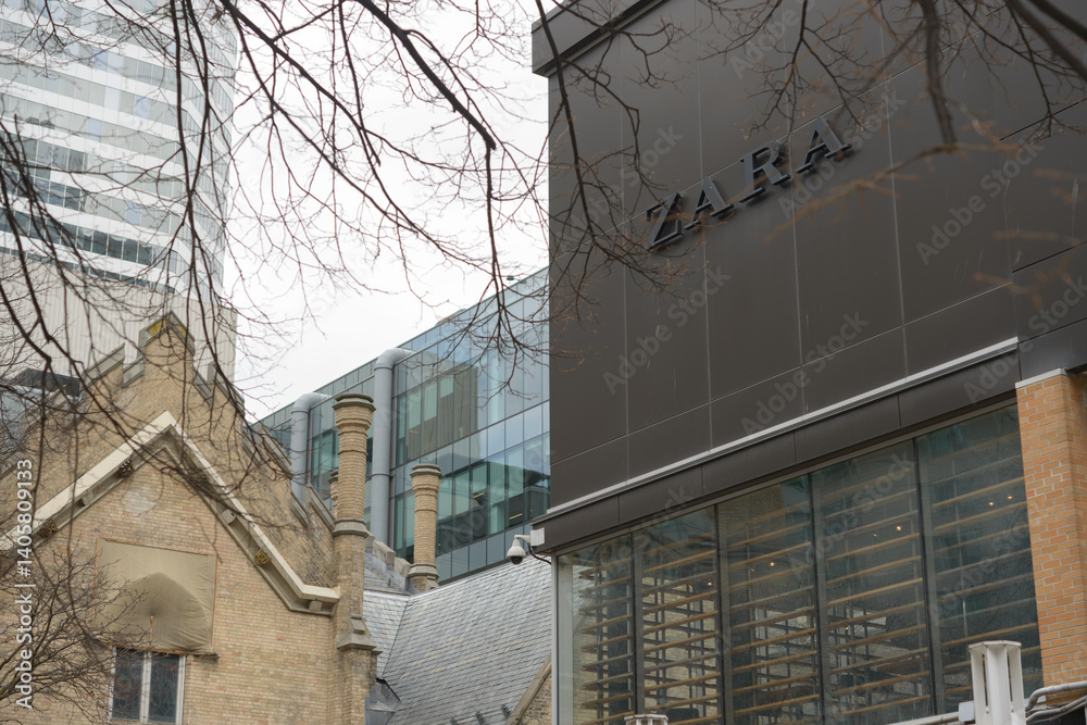 exterior building facade and sign of ZARA, a clothing store chain ...