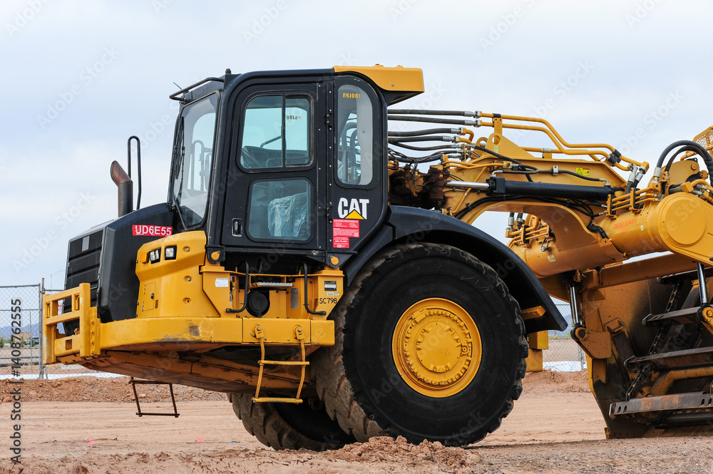 ide view of a Caterpillar 623H wheel tractor-scraper at a construction ...