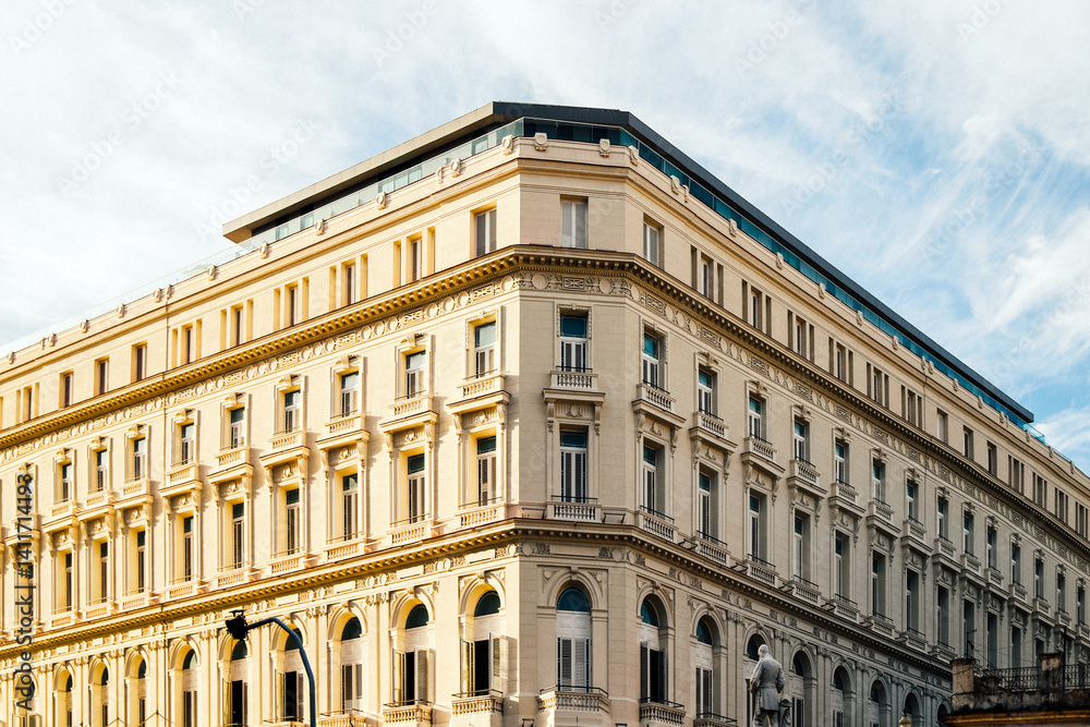 Corner view of a historic colonial building in Havana, Cuba, with deep ...