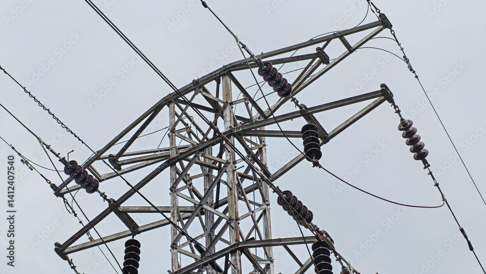 High voltage power line tower structure with insulators. Steel lattice ...