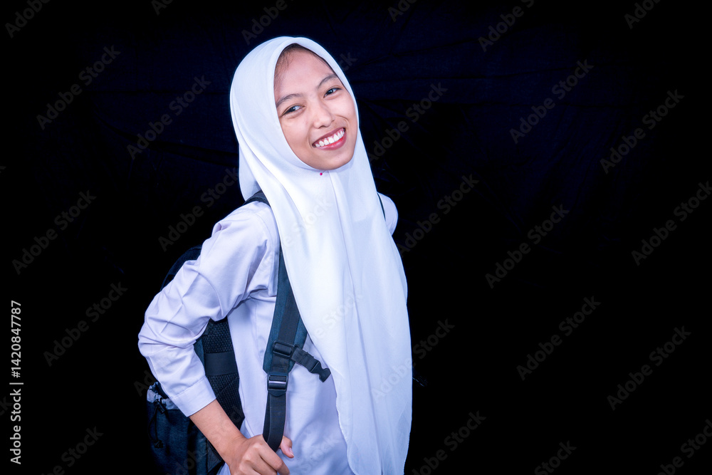The appearance of a middle to upper class Asian Muslim female student ...