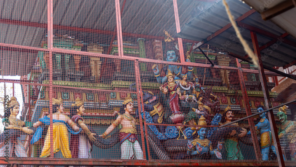 hindu god idols kept behind iron bar for protection at ancient temple ...