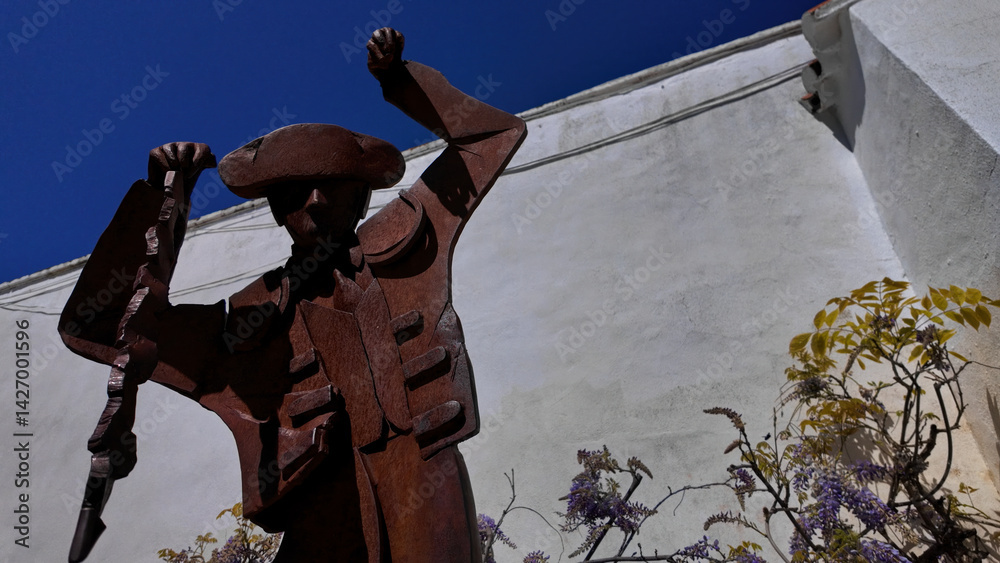 Rusty bullfighter statue celebrating victory in Ronda, Spain - RONDA ...