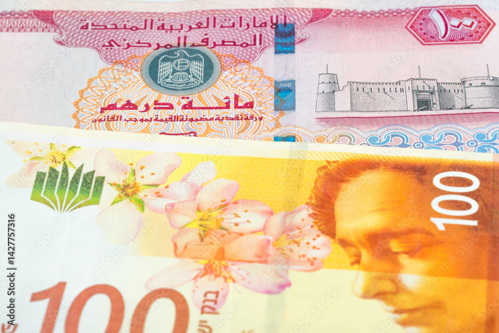 100 United Arab Emirates dirham and 100 Israeli shekel banknotes ...