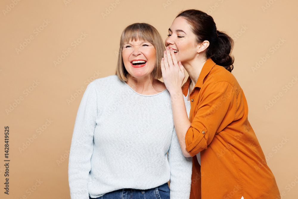 Elder parent mom 50s years old with young adult daughter two women ...