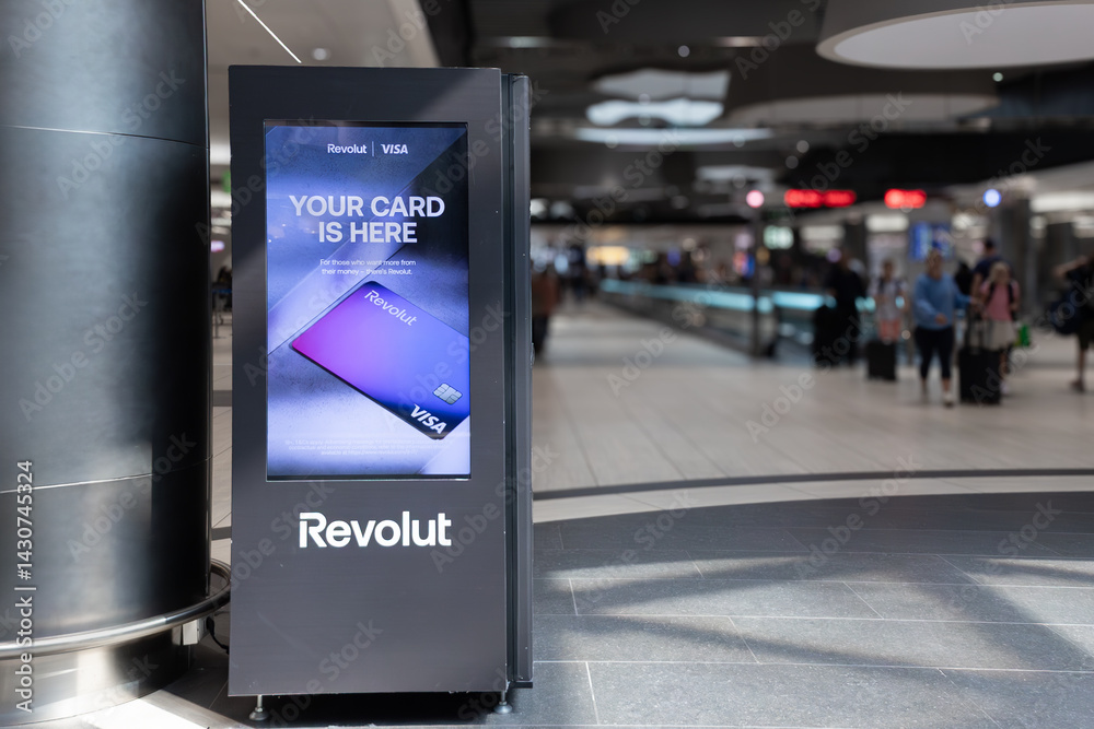 Modern digital signage displaying a vibrant credit card of online bank ...