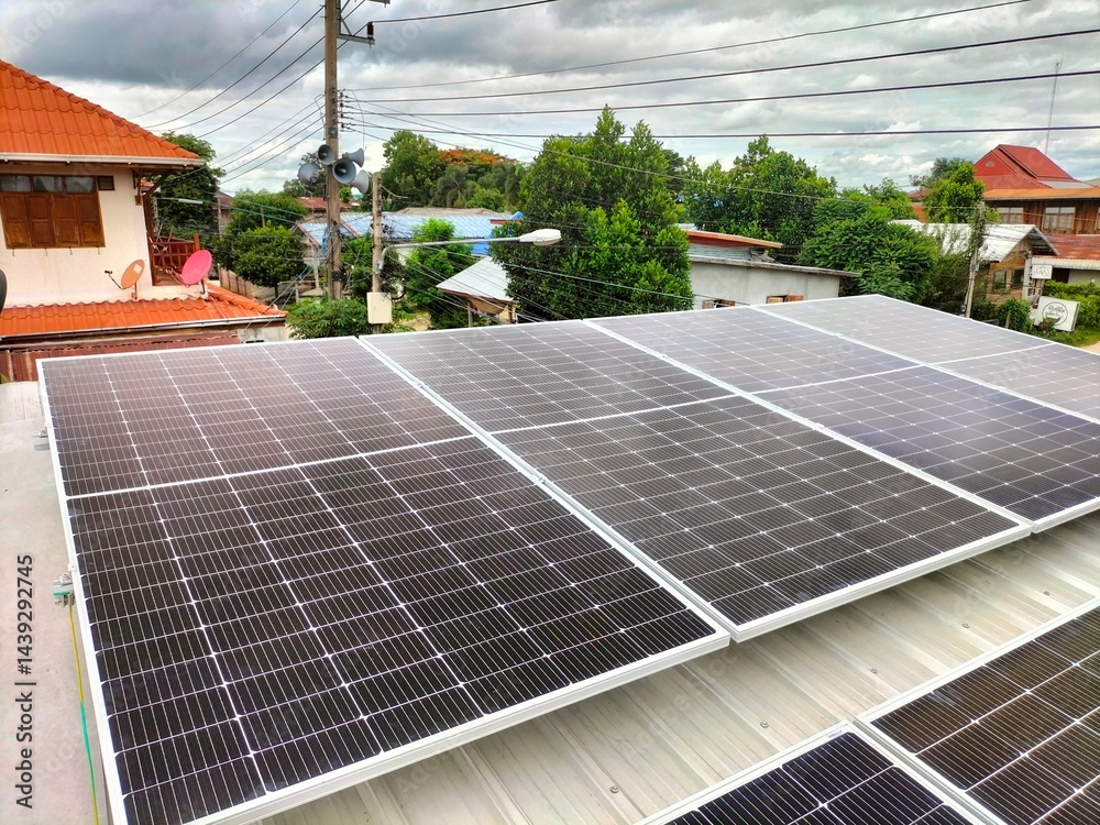 Installing solar panels on the roof to use as alternative energy for ...