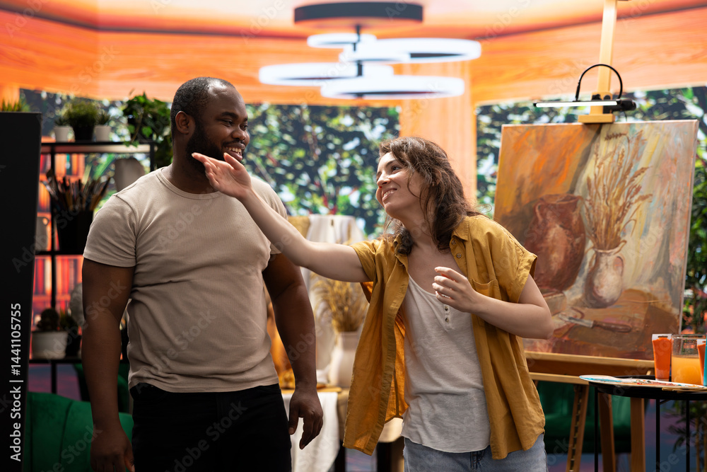 Painters team spend quality time on painting in their artistic studio ...