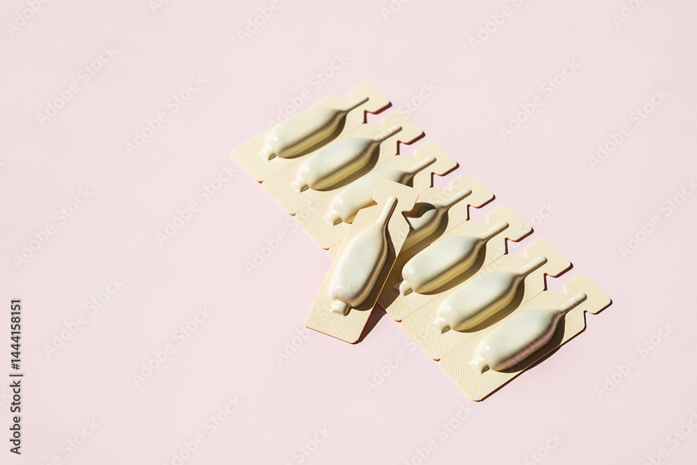 Suppositories in Blister Packaging Arranged on Pink. Medical and ...
