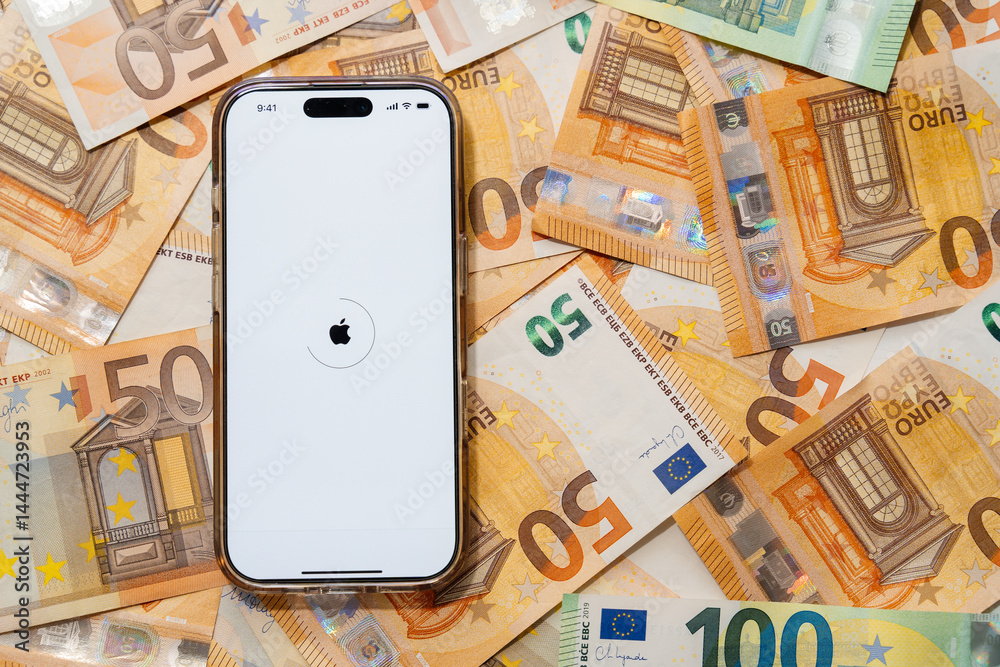 iPhone Startup Screen with Apple Logo on Euro Banknotes Stock Photo ...
